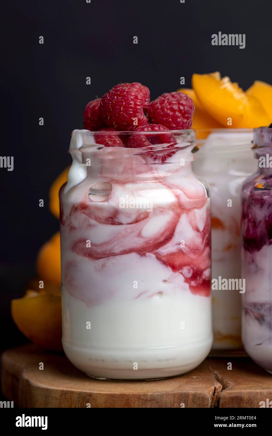 Fresh delicious milk yogurt with raspberry flavor, yogurt with fresh ...