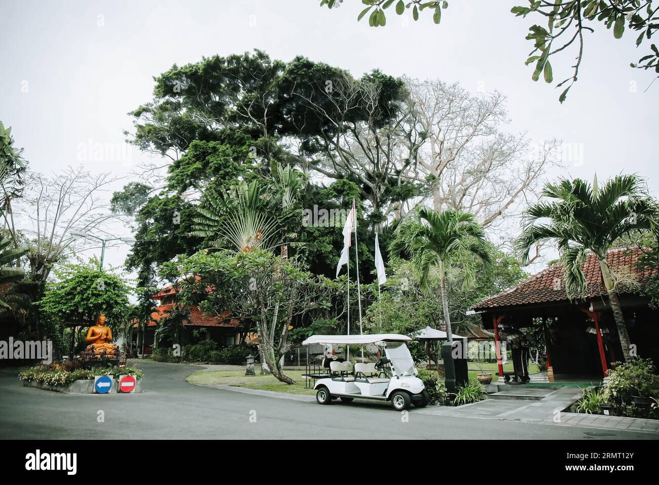 An empty golf cart or buggy car or shuttle parked on the resort area in ...