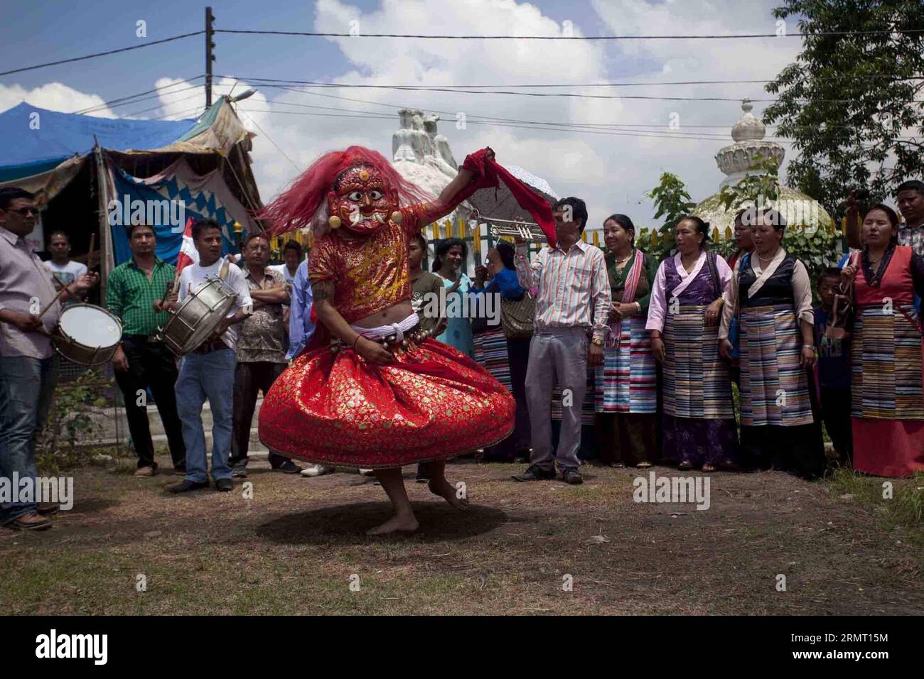 (140809) -- KATHMANDU, -- A Nepalese indigenous man performs during the ...