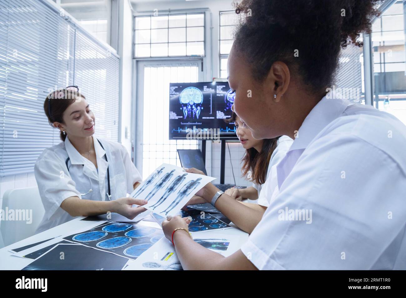 young female doctor student internship team group meeting and ...