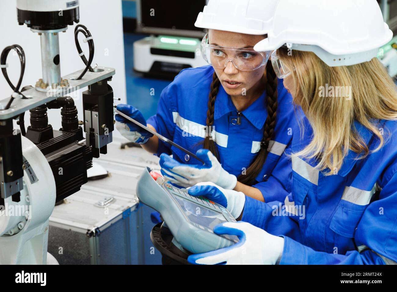 female automation machine engineer student study and inspection control ...