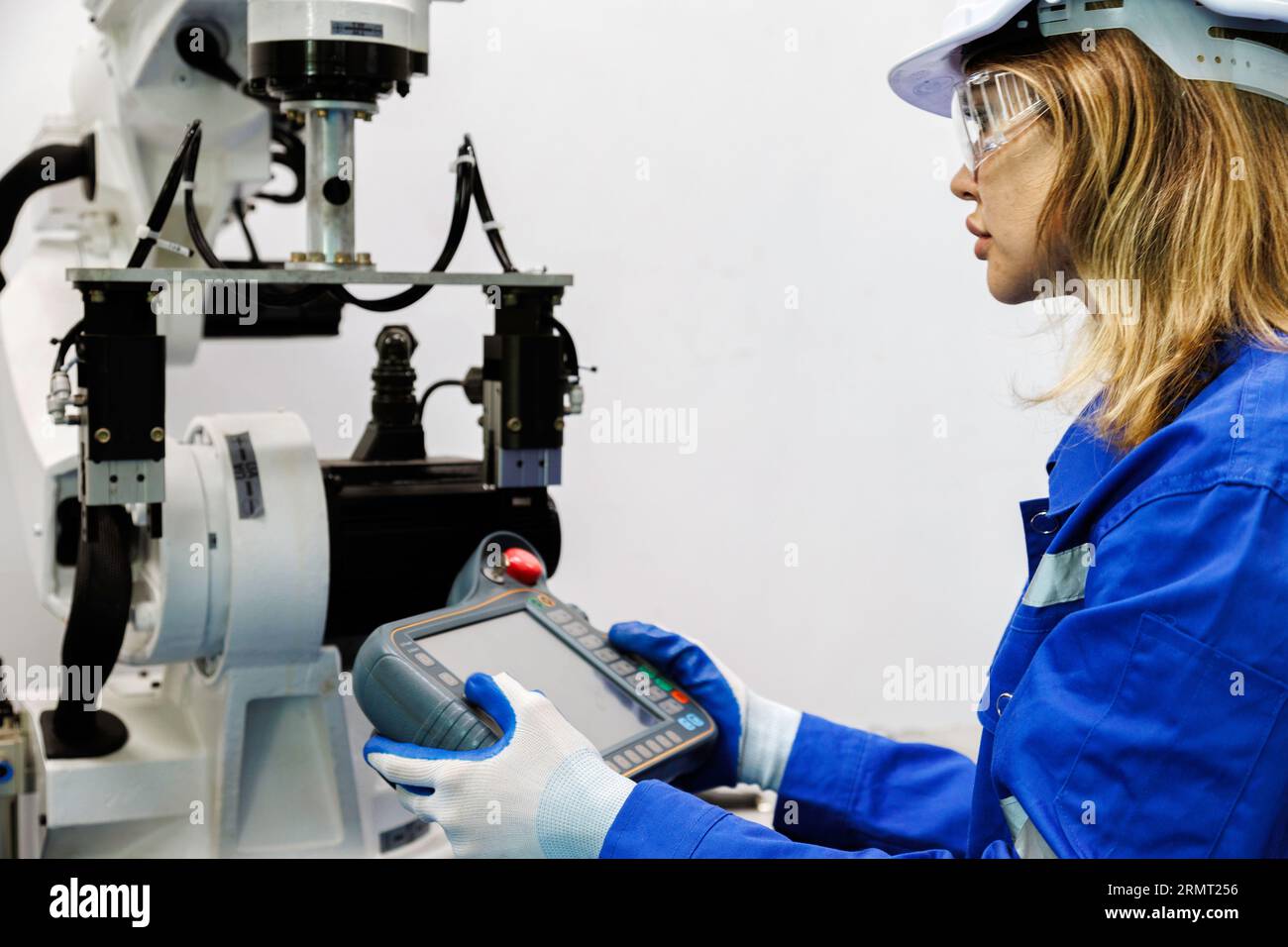 female automation machine engineer student study and inspection control ...