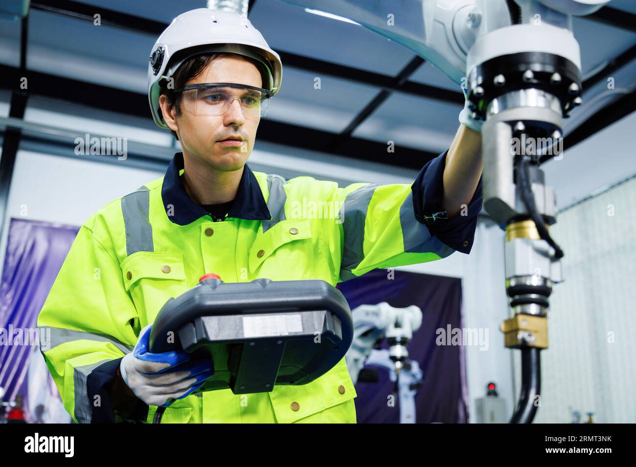 male automation machine engineer student study and inspection control ...