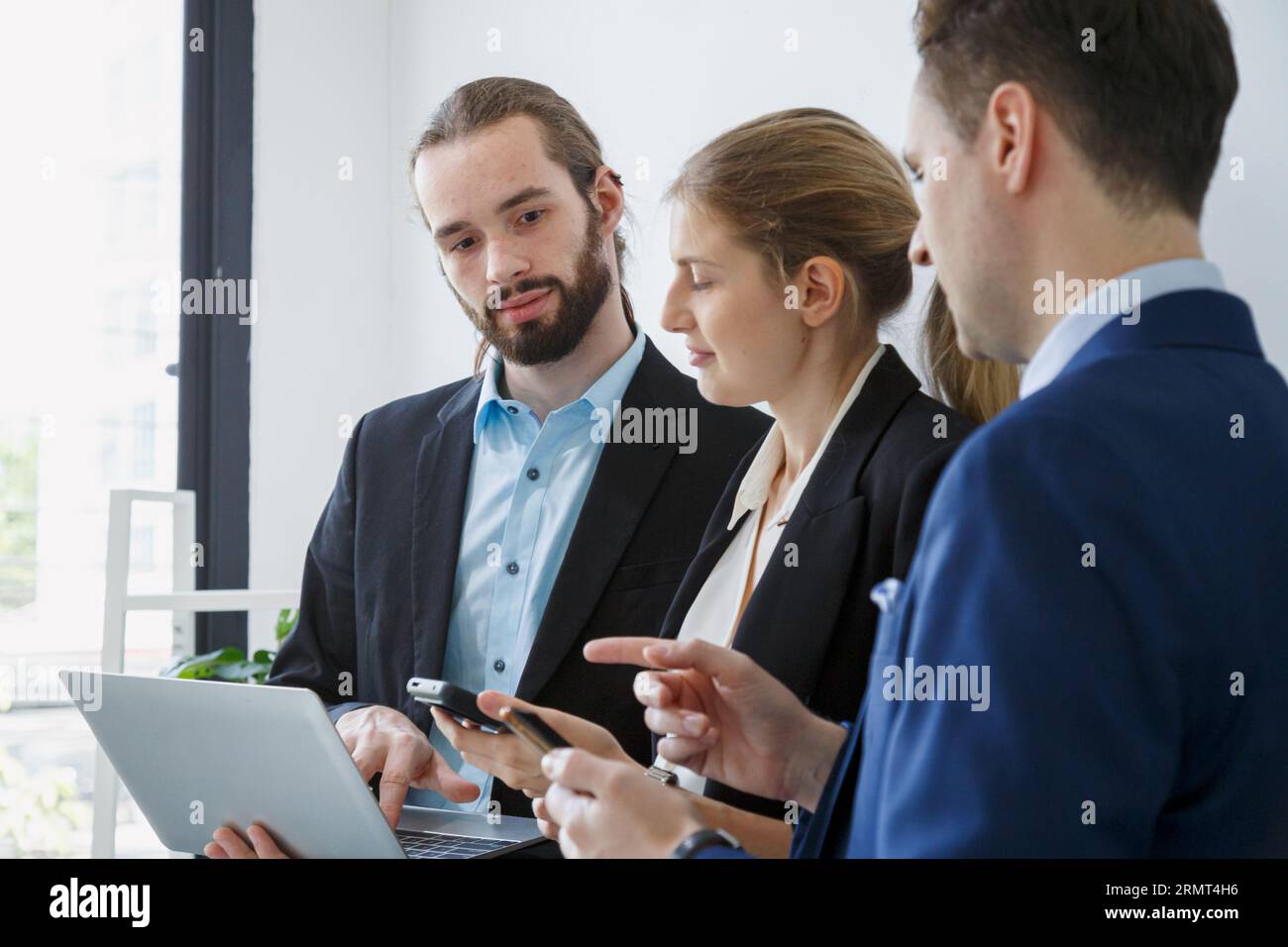 Business team working on master plan. Happy smiling businessman and ...