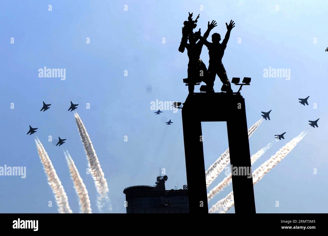(140817) -- JAKARTA, -- Indonesian Air Force jet fighters fly over the ...