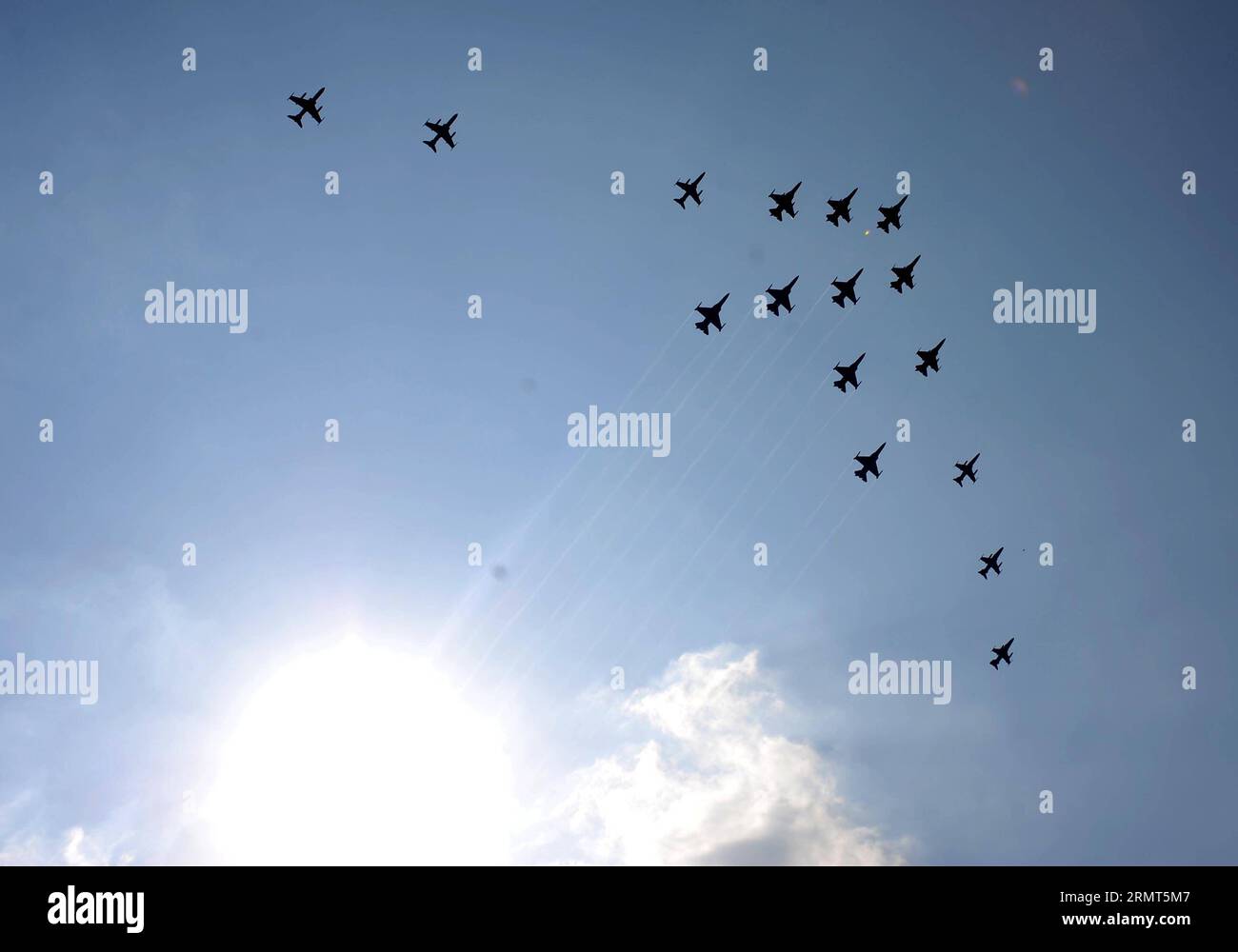 (140817) -- JAKARTA, -- Indonesian Air Force jet fighters fly over the ...
