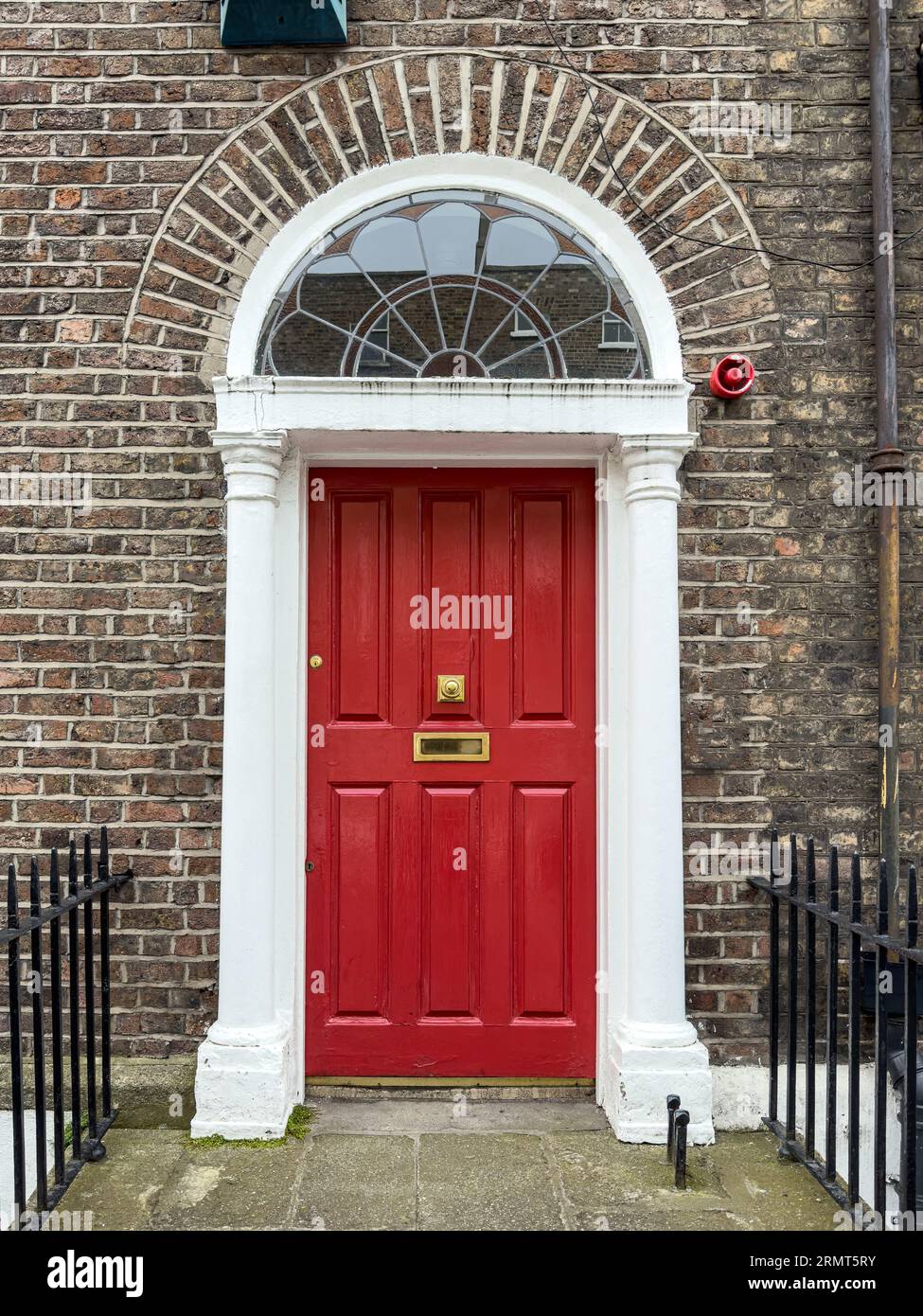 A famous red painted Georgian door in Dublin, capital of Ireland Stock ...
