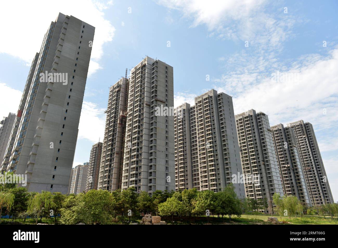 Photo taken on Aug. 16, 2014 shows the residential buildings under ...
