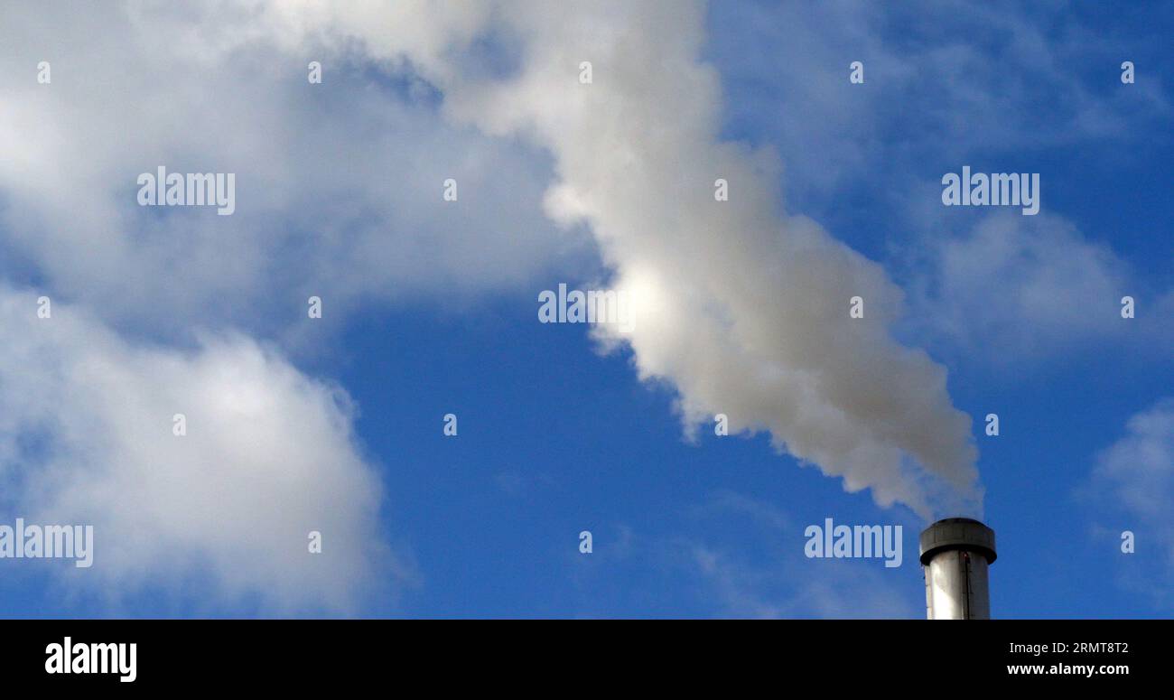 Steam of Water coming out of the Chimney of an Incinerator, Near Paris ...