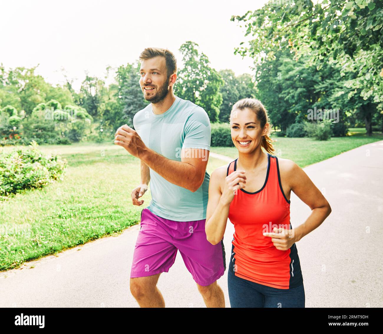 fitness woman park exercise lifestyle outdoor sport healthy couple ...