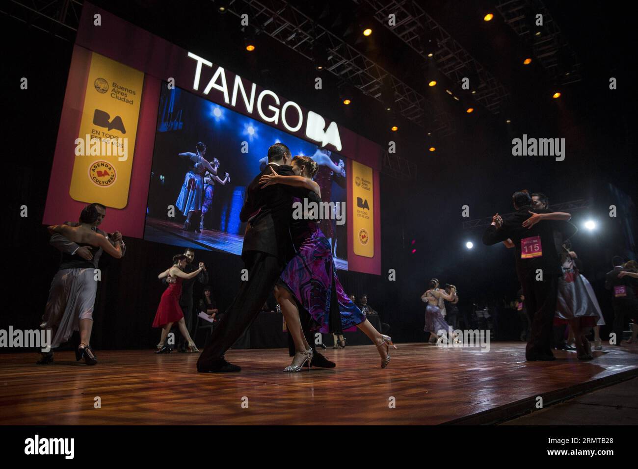 People compete in the final of the Floor modality of the World Tango ...