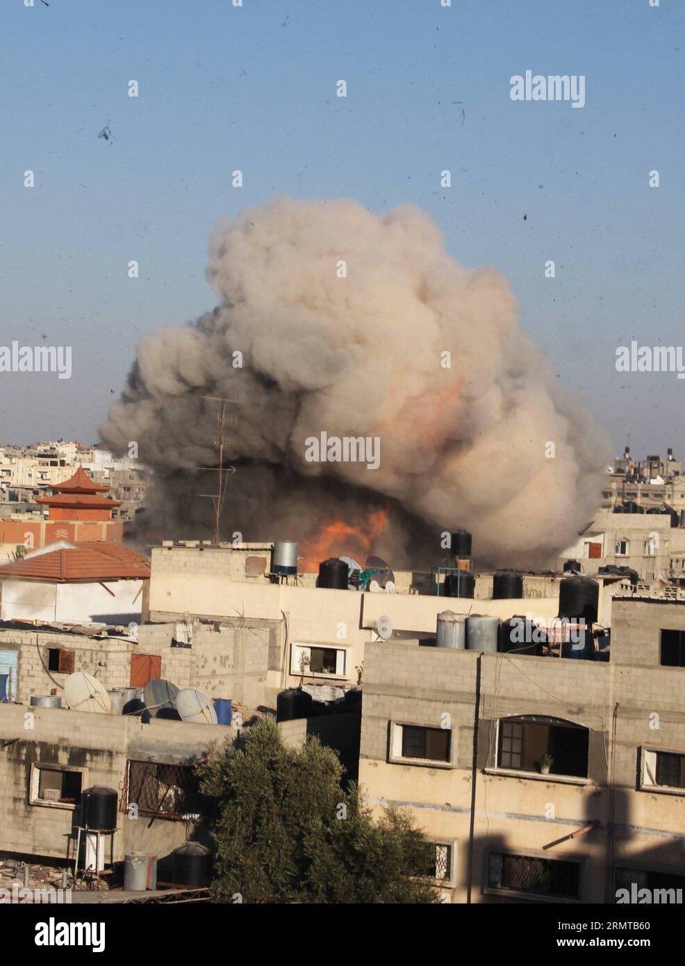 Photo taken on Aug. 26, 2014 shows an explosion caused by missile from ...
