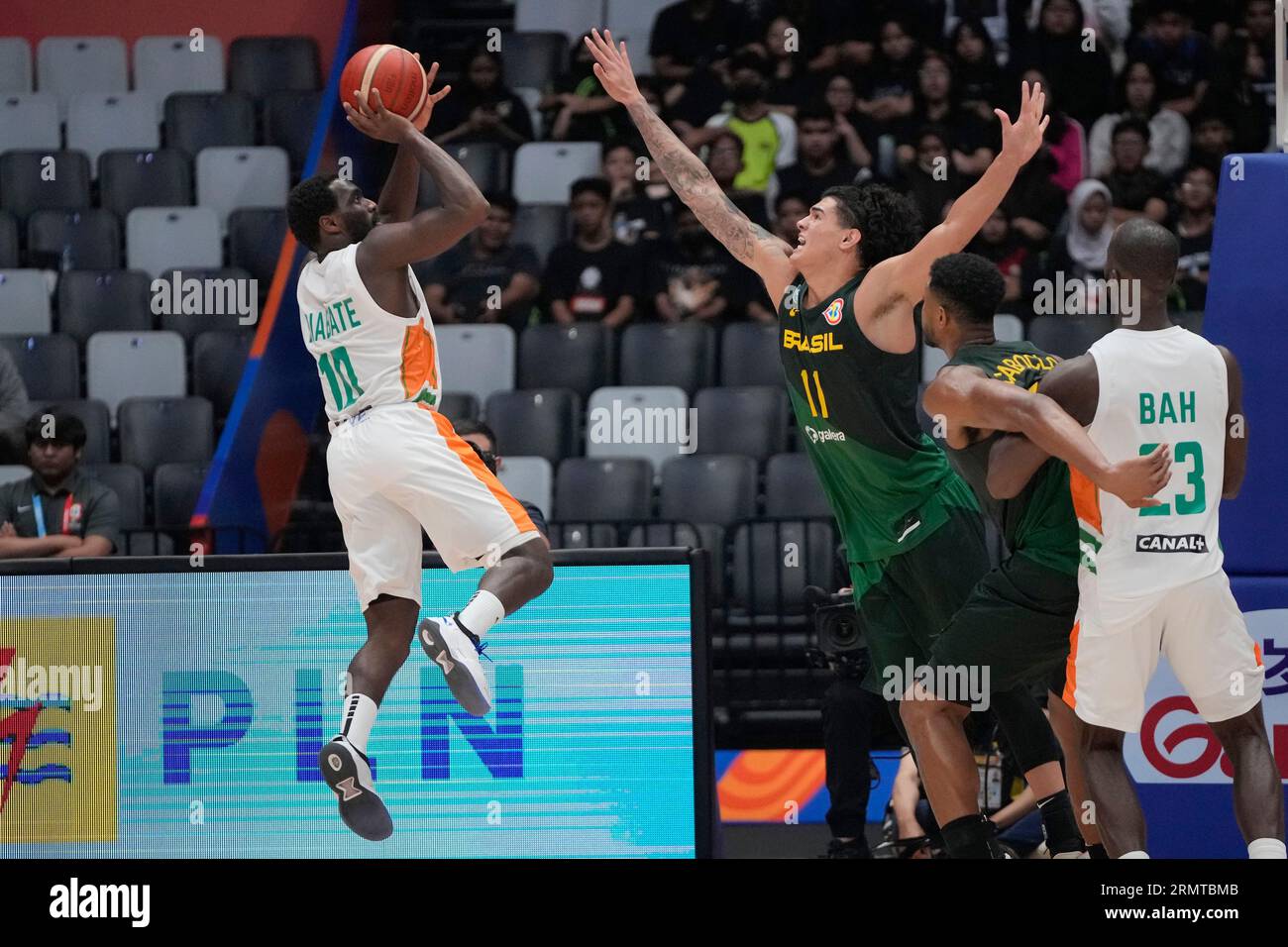 Ivory Coast guard Solo Diabate (10) shoots against Brazil guard Gui ...