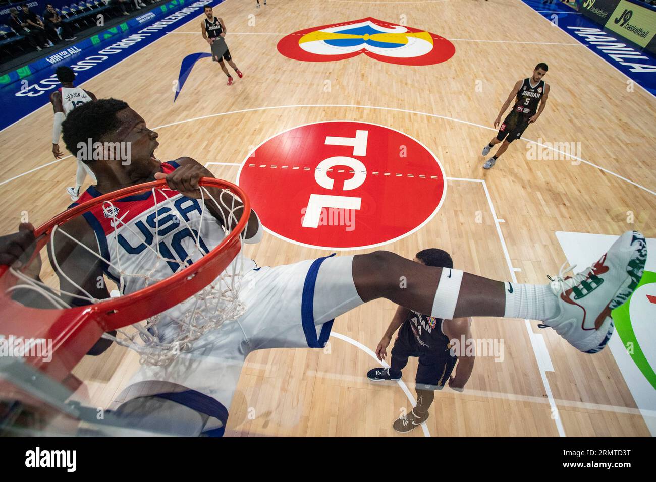 Team USA guard Anthony Edwards (10) celebrates after dunking the ball ...