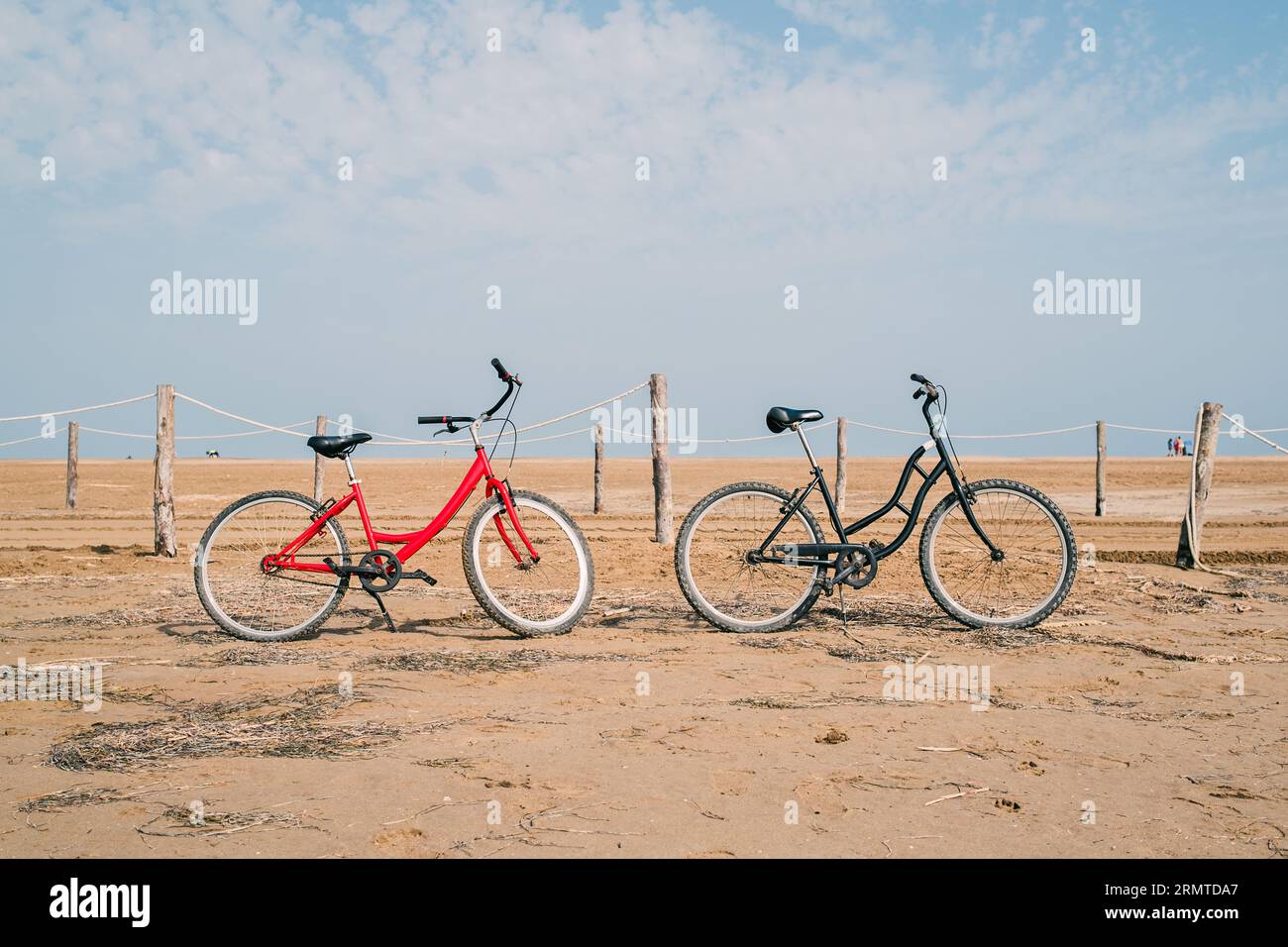 two old bikes at the beach in front of the sea Stock Photo - Alamy