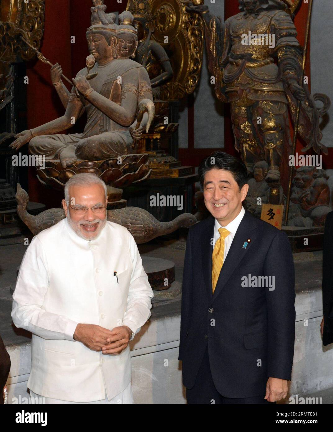 Indian Prime Minister Narendra Modi (L), accompanied by his Japanese ...