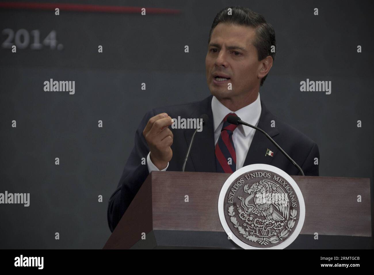 The Mexican President, Enrique Pena Nieto, delivers a speech during a ...