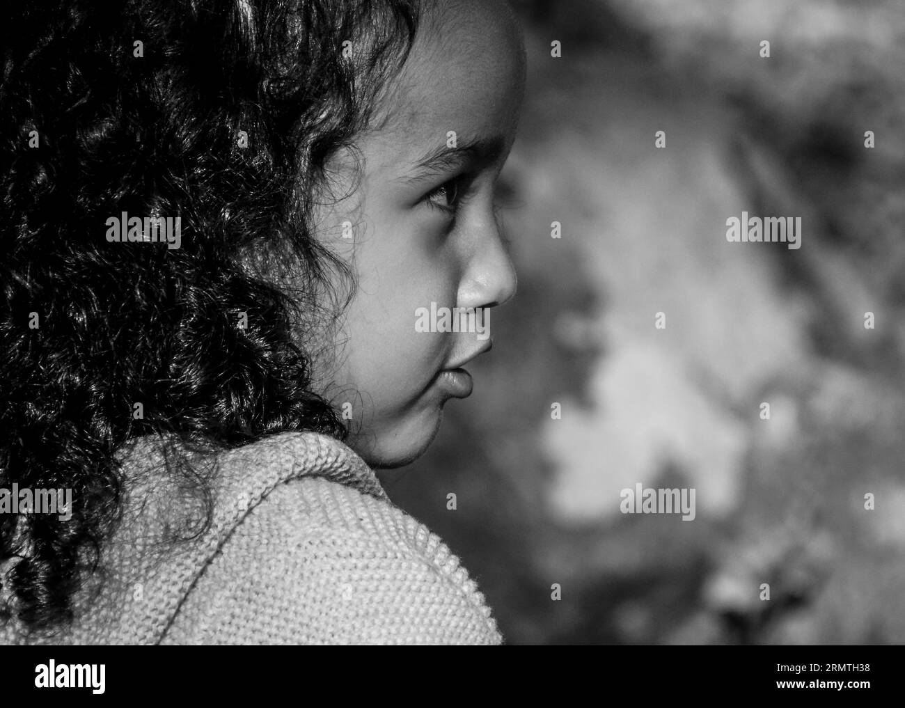 a close up of a girl in black and white Stock Photo - Alamy