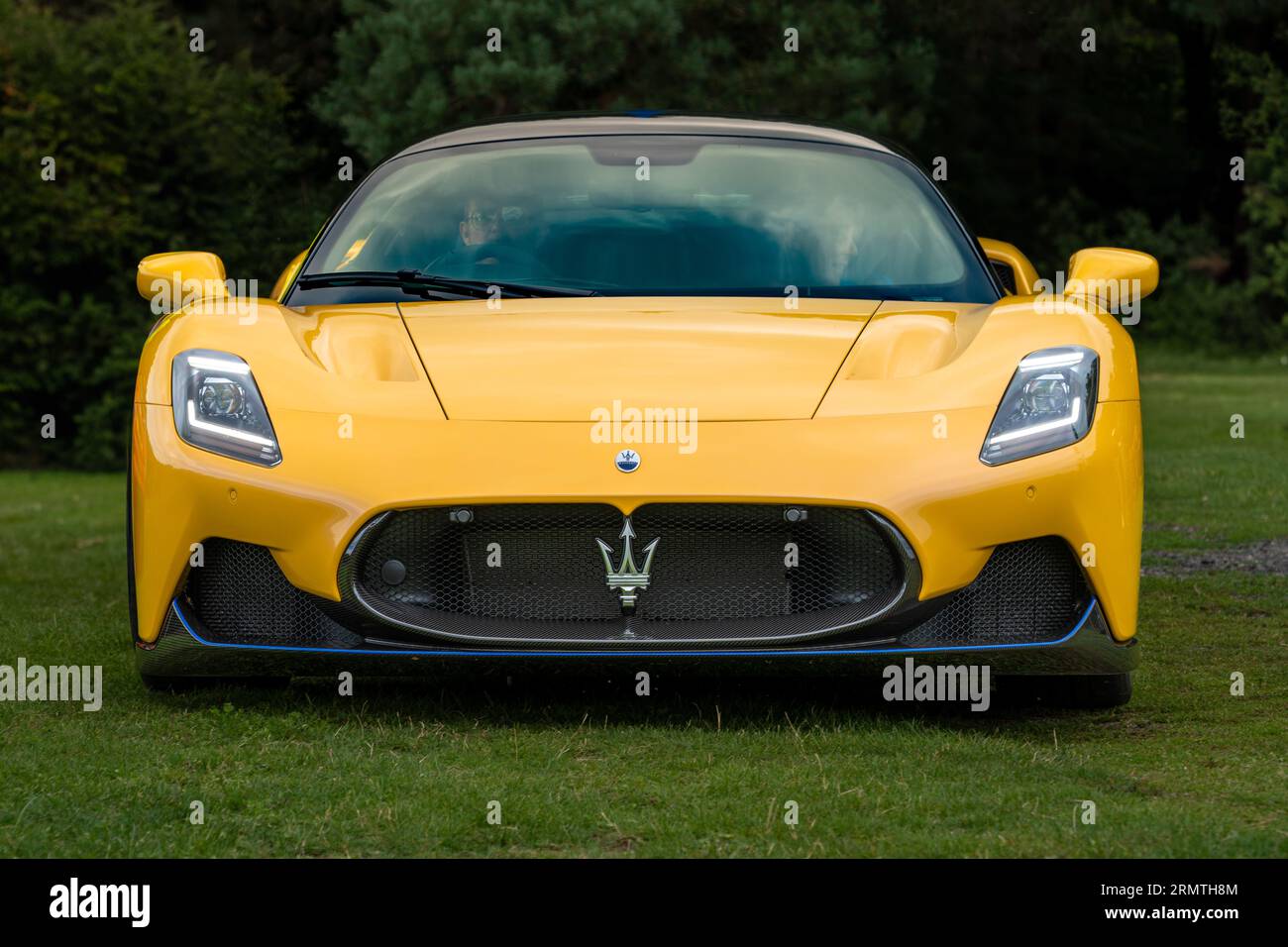 Maserati MC20 Super Car in Yellow Stock Photo - Alamy