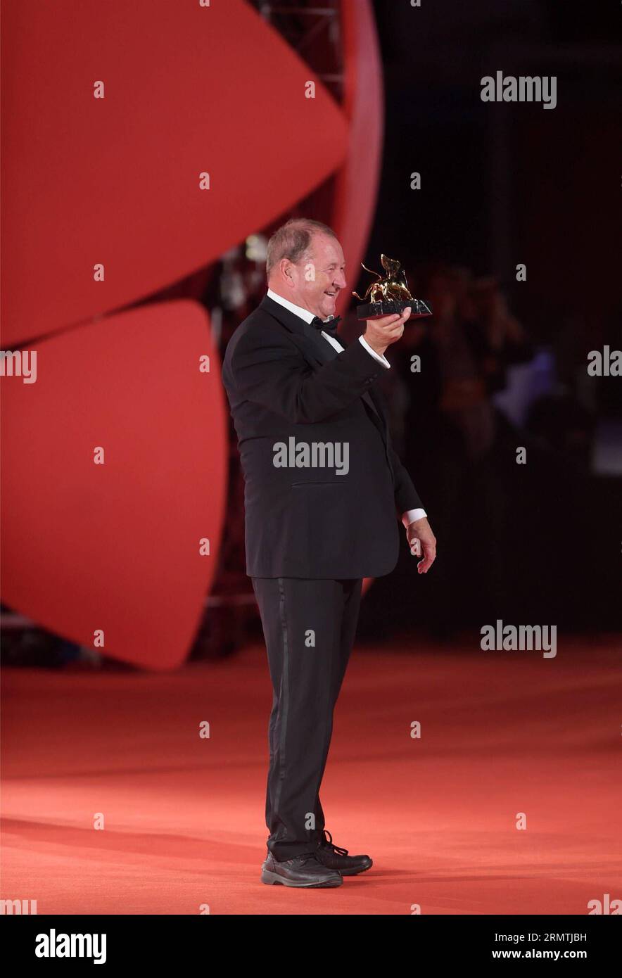 Director Roy Andersson poses with Golden Lion for Best Film he received ...