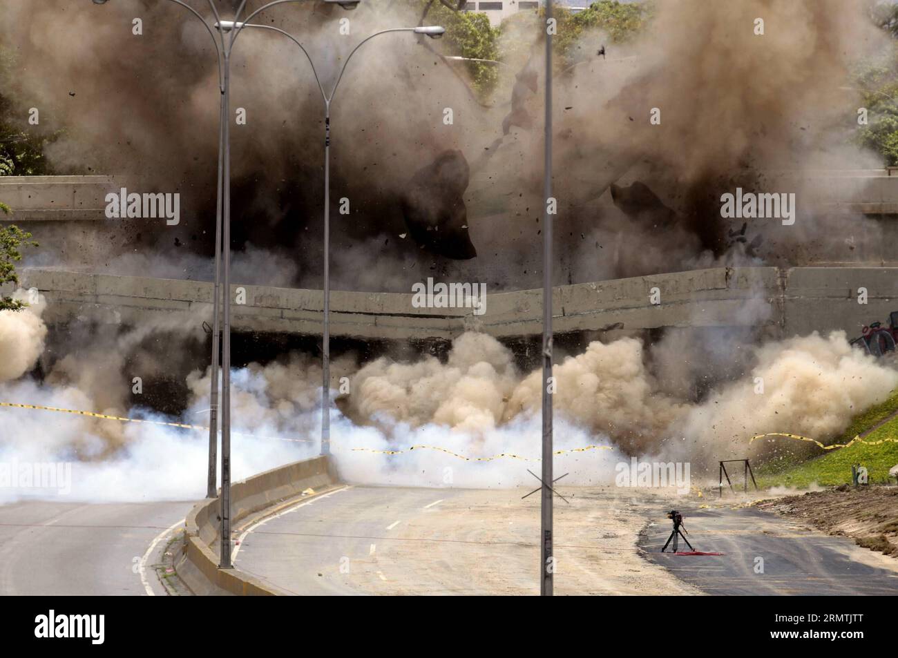 Is demolished in a controlled explosion hi-res stock photography and ...