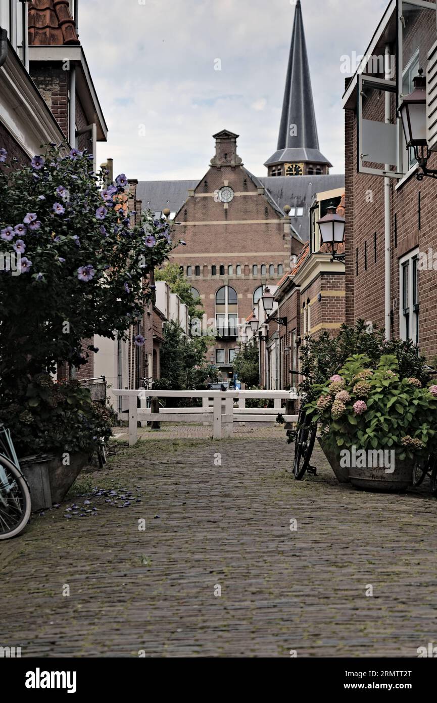 Traditional Picturesque cobblestone street in the Netherlands with a ...