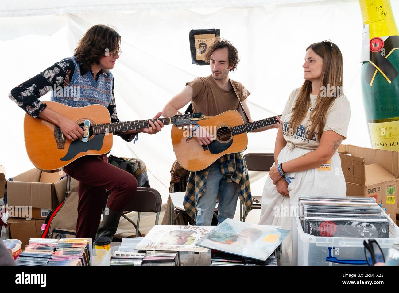 Spencer Cullum, Sean Thompson and Erin Rae play the merch tent at Green ...