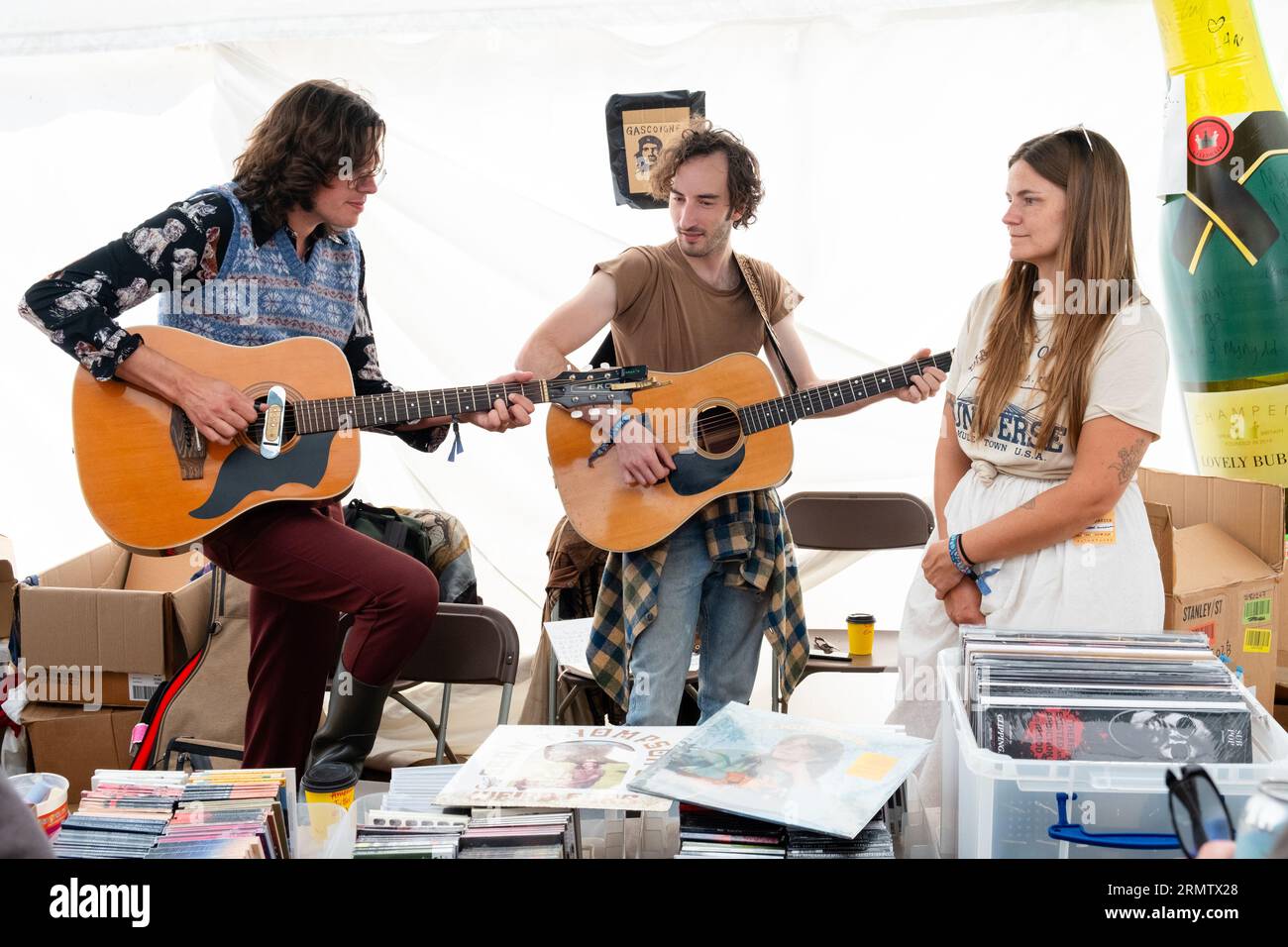 Spencer Cullum, Sean Thompson and Erin Rae play the merch tent at Green ...