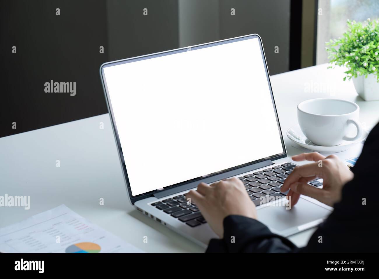 Closeup shot of hands using laptop and typing on keyboard, searching ...