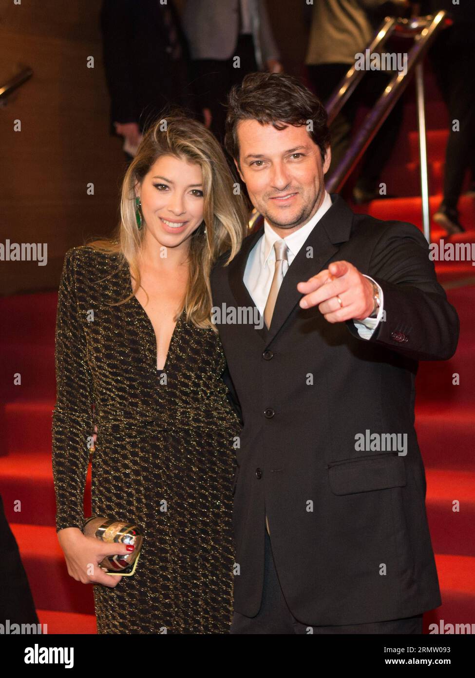(140925) -- RIO DE JANEIRO, Sept. 25, 2014 -- Brazilian actor Marcelo Serrado and his wife ...