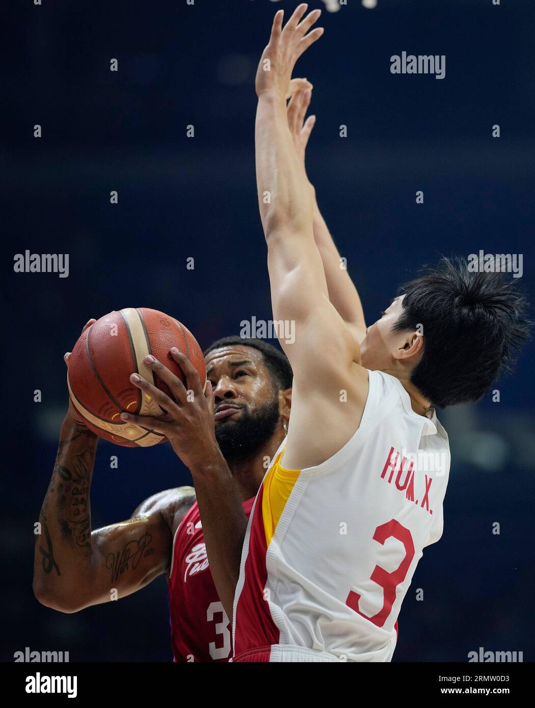 Puerto Rico guard Jordan Howard (3) against China point guard Hu ...