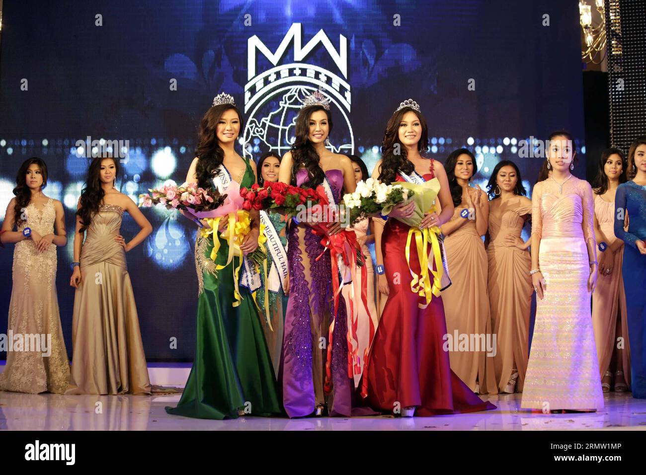 Miss Myanmar World Wyne Lay (C Front) poses for photos after winning ...