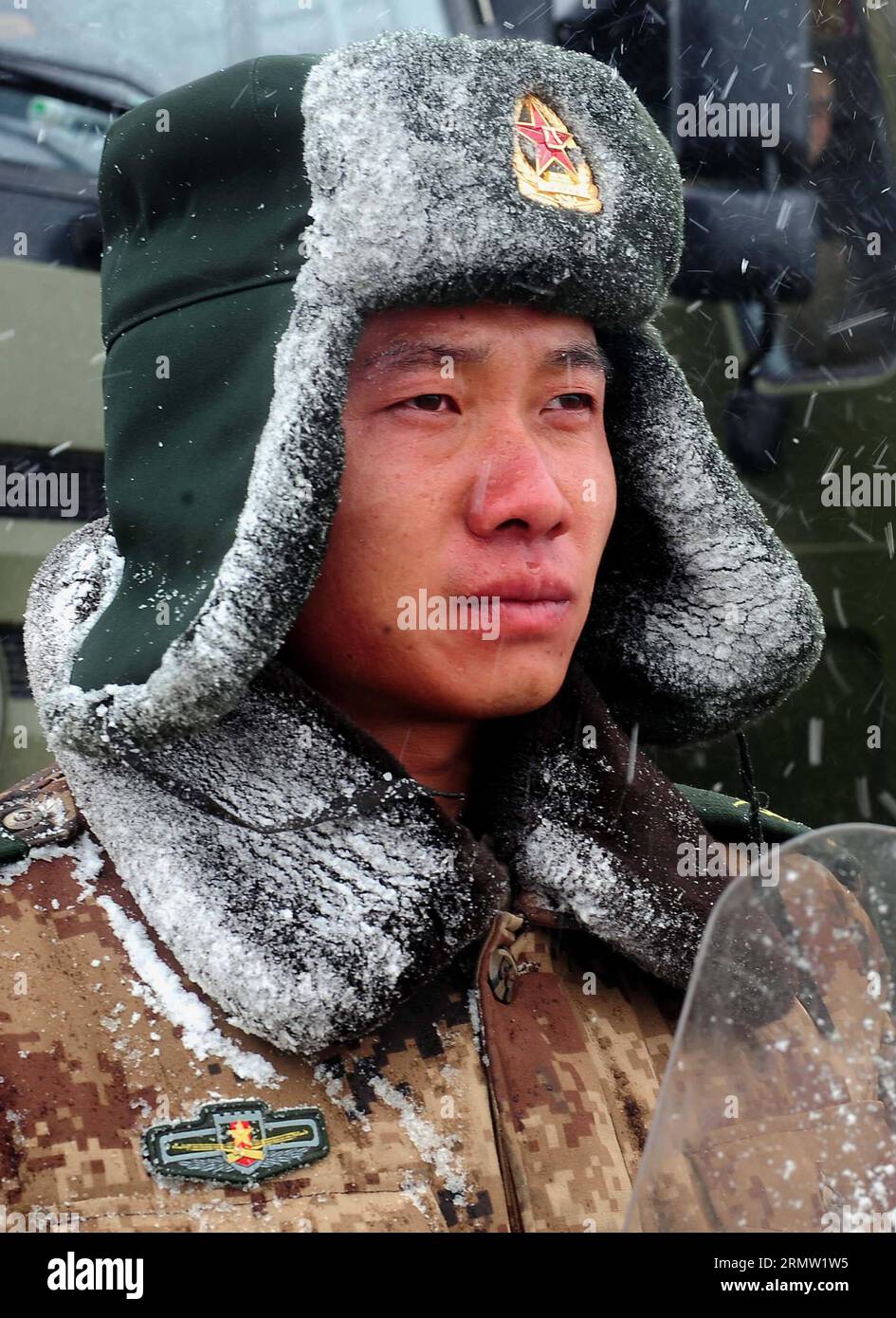 A soldier of a truck transportation regiment of the Qinghai-Tibet Corps ...