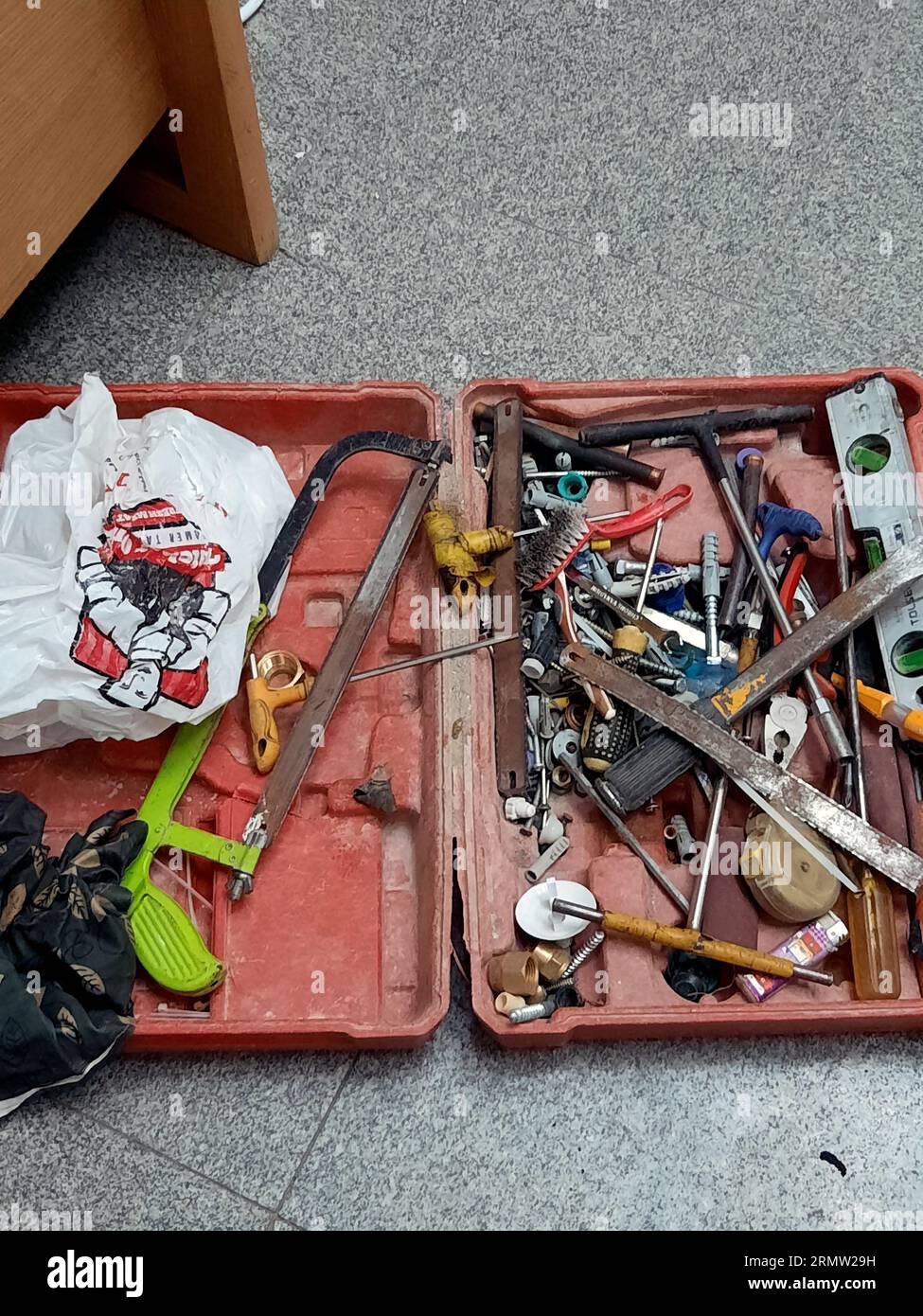 Cairo, Egypt, August 24 2023: Portable toolbox with various set of useful tools for maintenance ...