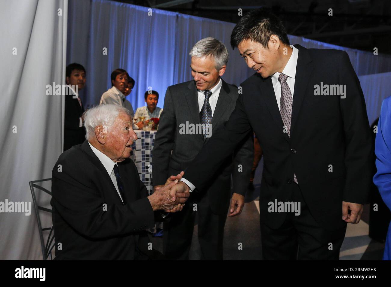 Song Zhiyong (R), president of Air China, and John Wojick (C), senior ...