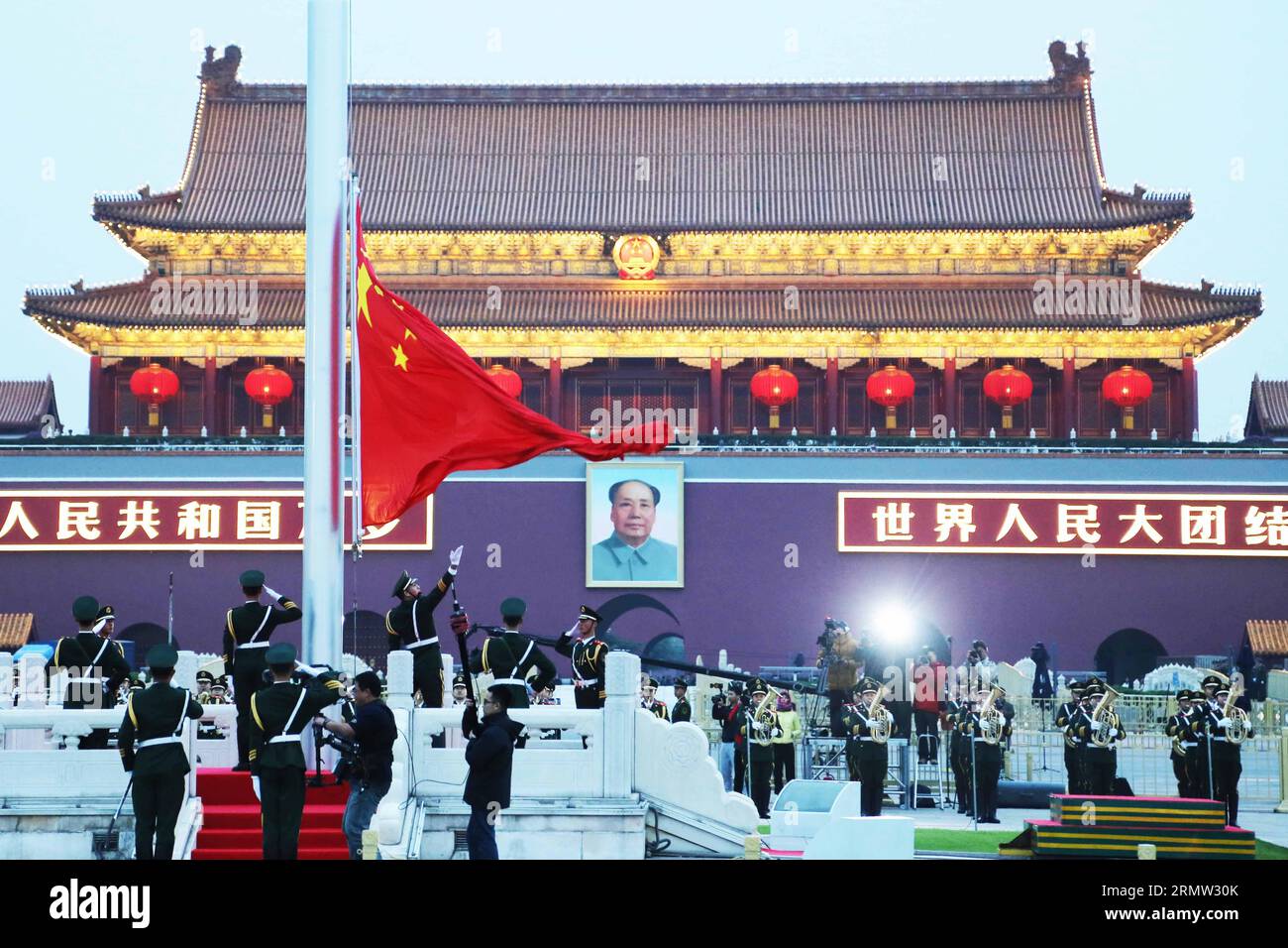(141001) -- BEIJING, Oct. 1, 2014 -- A flag-raising ceremony marking ...