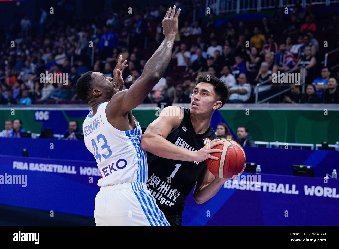 Greece forward Thanasis Antetokounmpo (43) tries to trap New Zealand ...