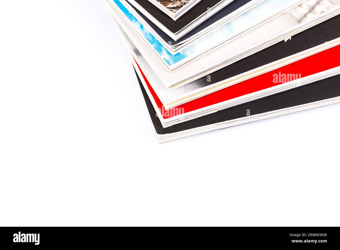 Magazines up close shot on white background Stock Photo - Alamy