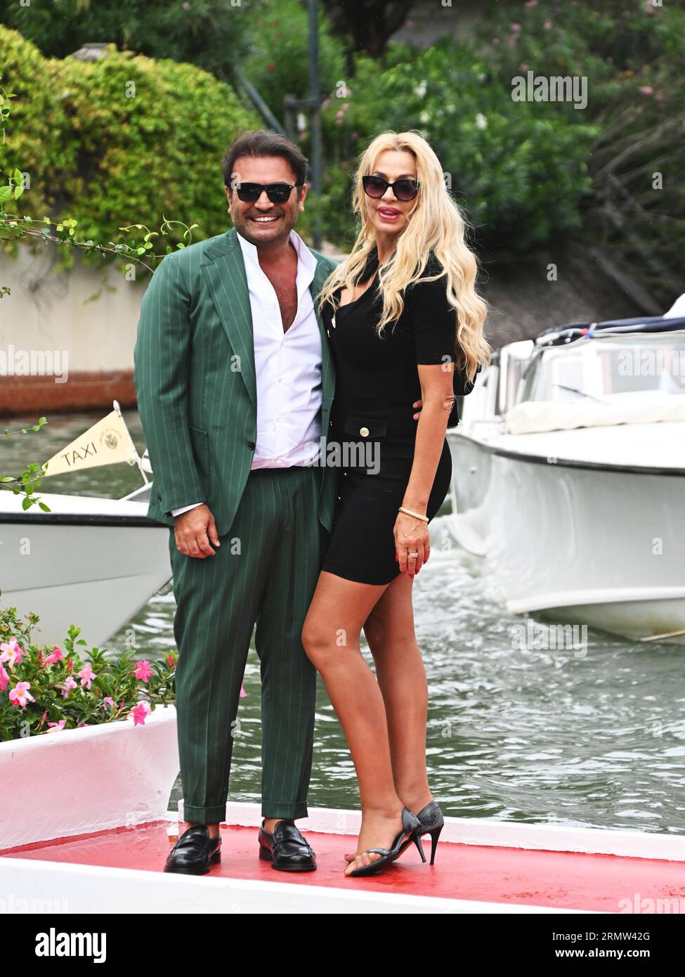 Venice, Italy. 30th Aug, 2023. day 1 - Valeria Marini with her partner ...