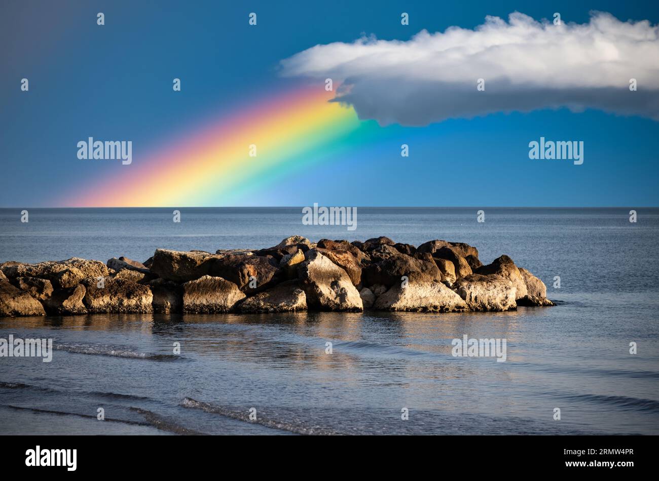 Rainbow sea cliff people hi-res stock photography and images - Alamy