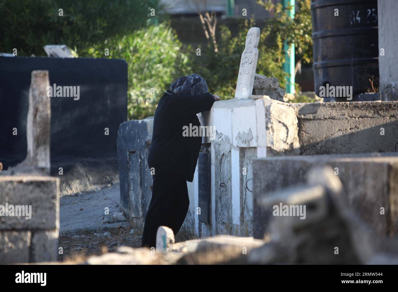 (141004) -- BETHLEHEM, Oct. 4, 2014 -- A Palestinian woman visits ...