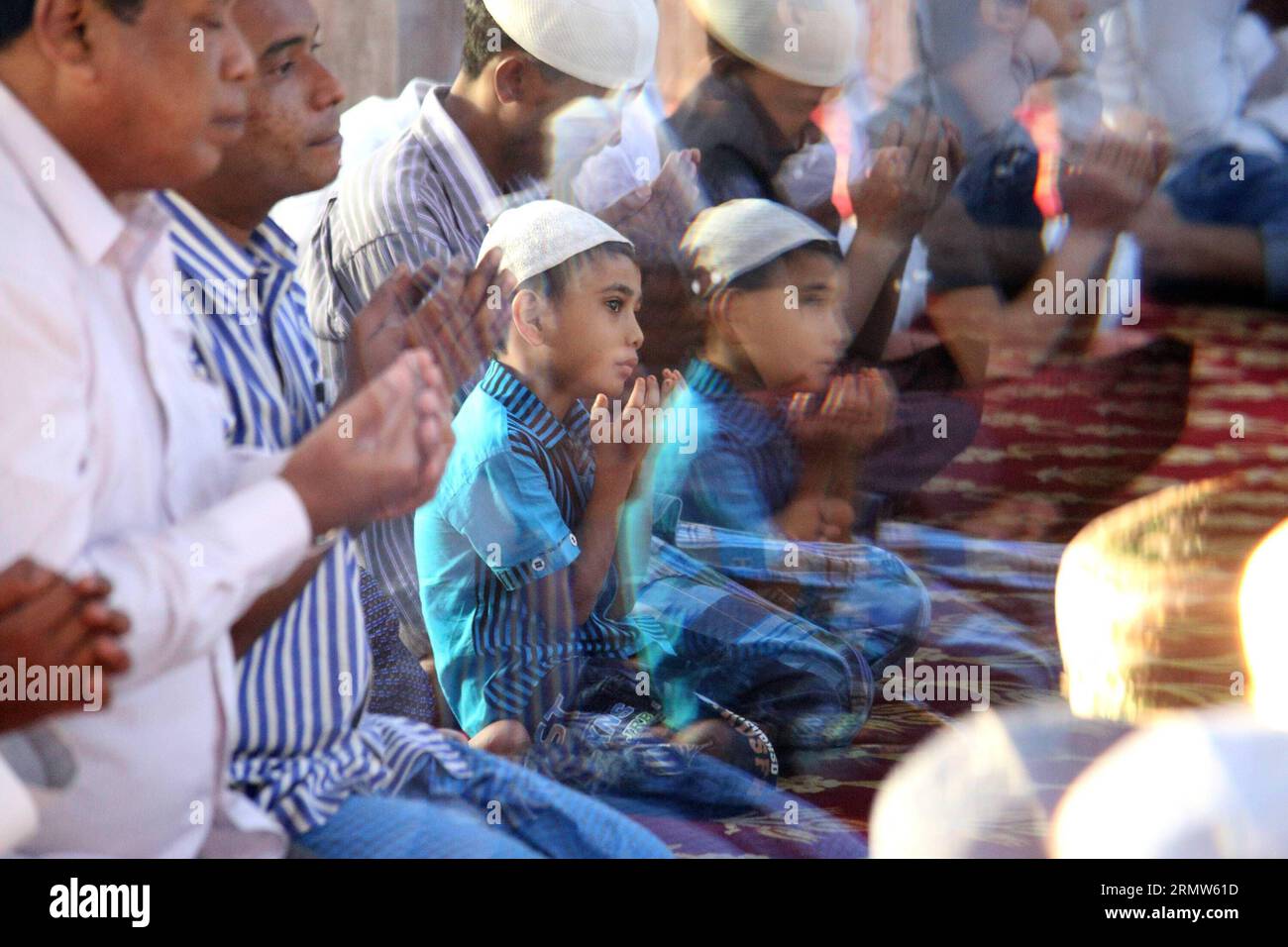 Myanmar muslims pray during the Eid al-Adha Festival at a Mosque in ...