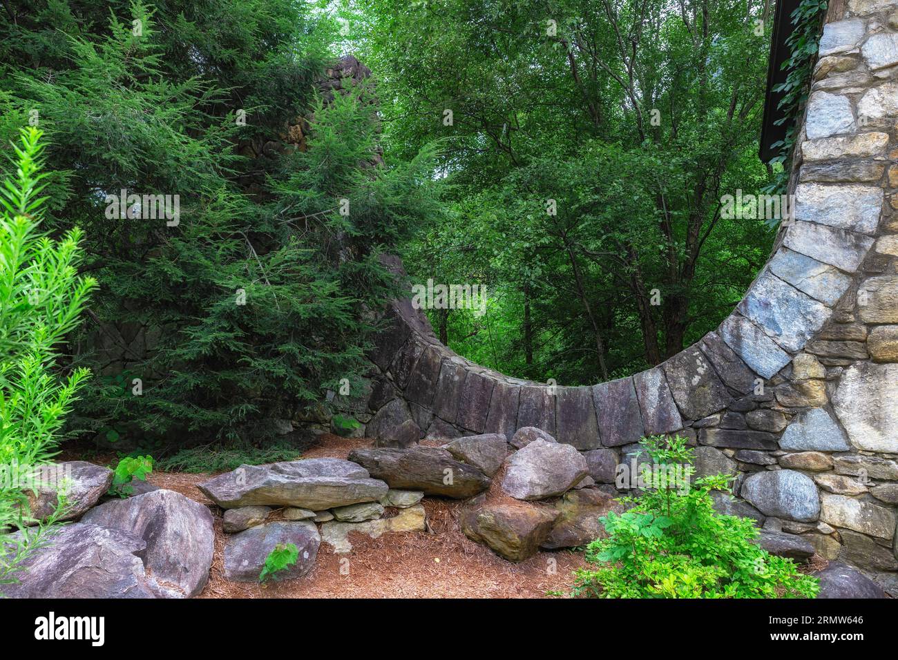 Lovely background of a rock structure half framing the forest in the ...