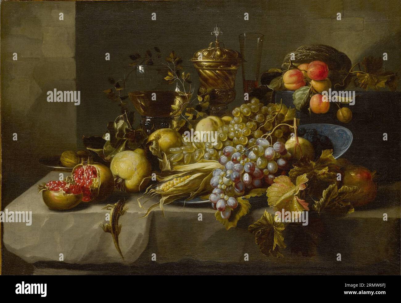 Still life of grapes, pomegranates, walnuts, peaches, an ear of corn ...