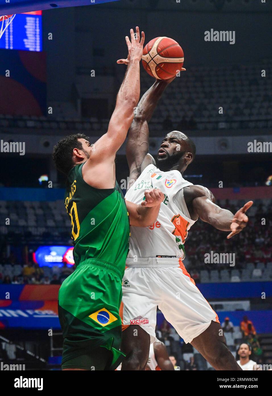 Jakarta, Indonesia. 30th Aug, 2023. Cedric Bah (R) of Cote d'Ivoire ...