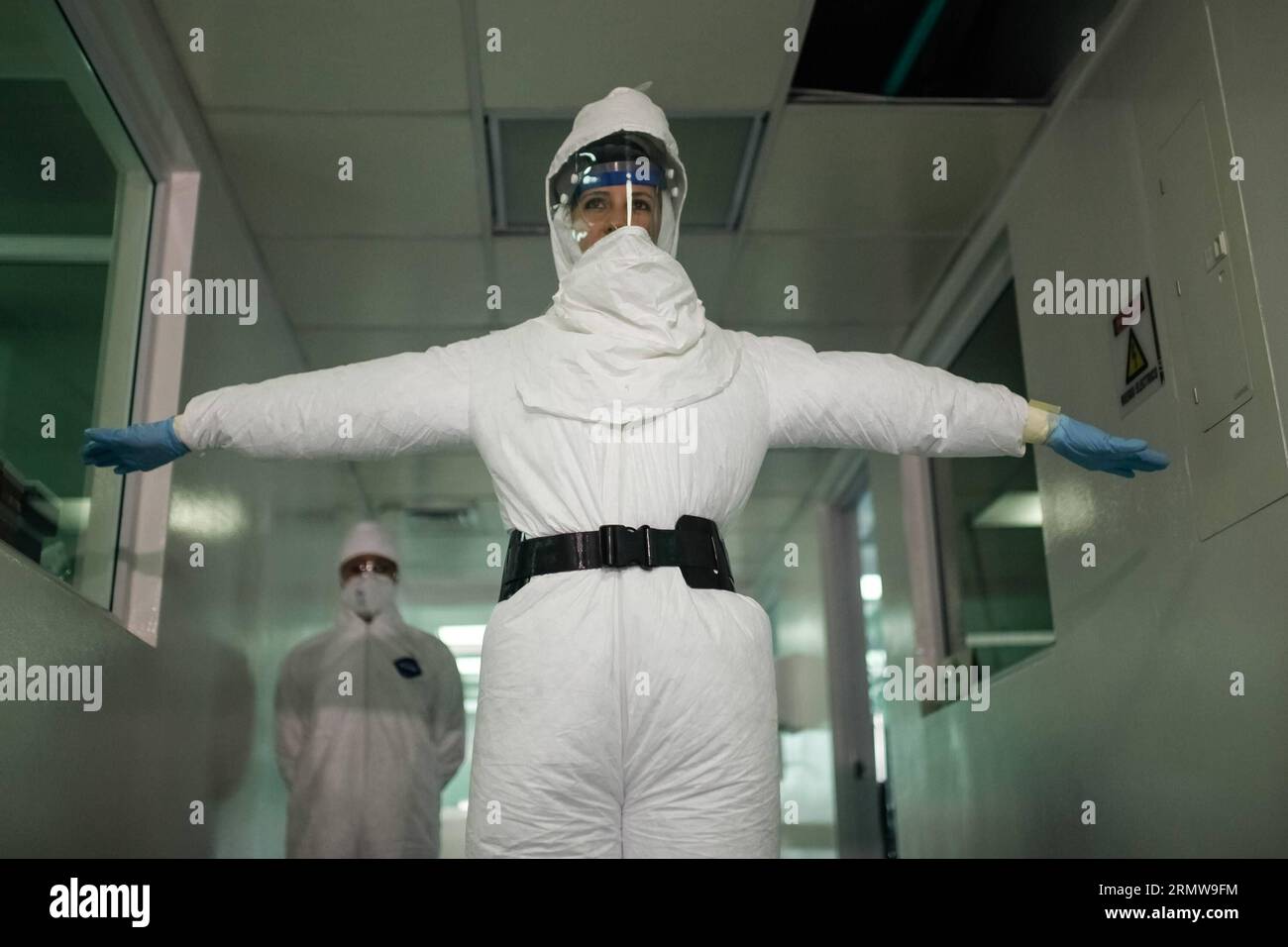 Biosecurity suit hi-res stock photography and images - Alamy