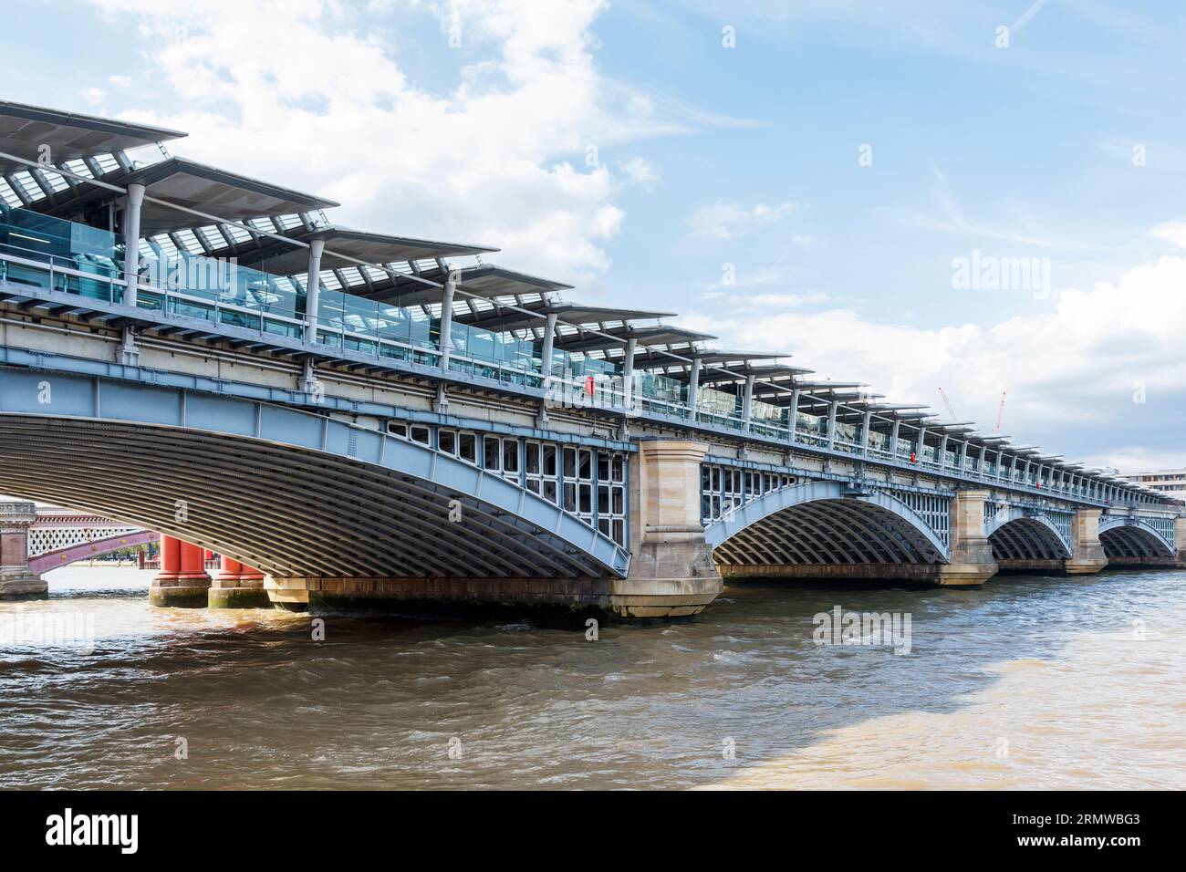 Blackfriars railway bridge and station on the River Thames, London, UK ...
