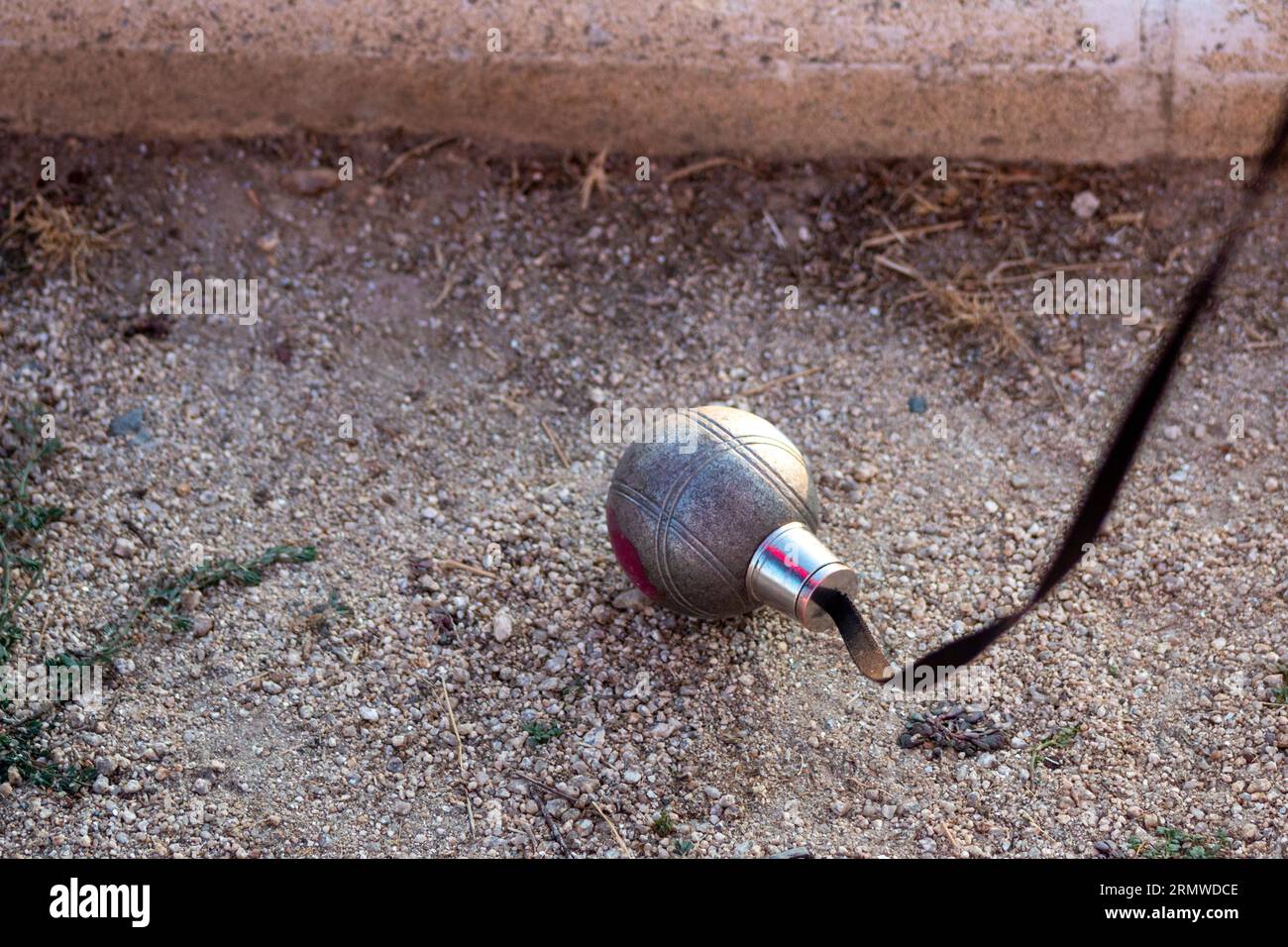 Petanque game. You can see the steel balls of different colors and the ...