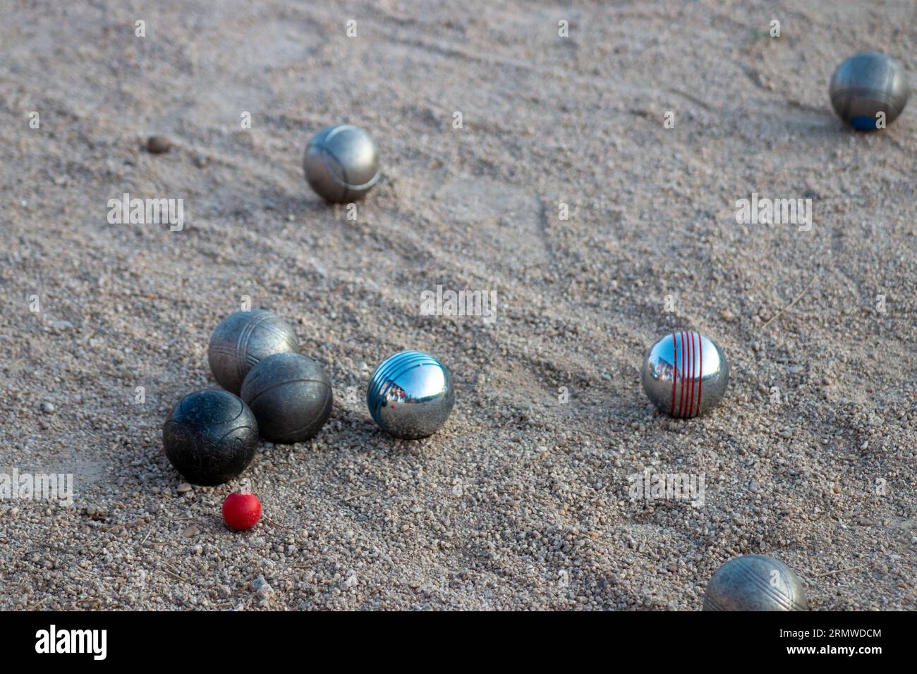 Petanque game. You can see the steel balls of different colors and the ...