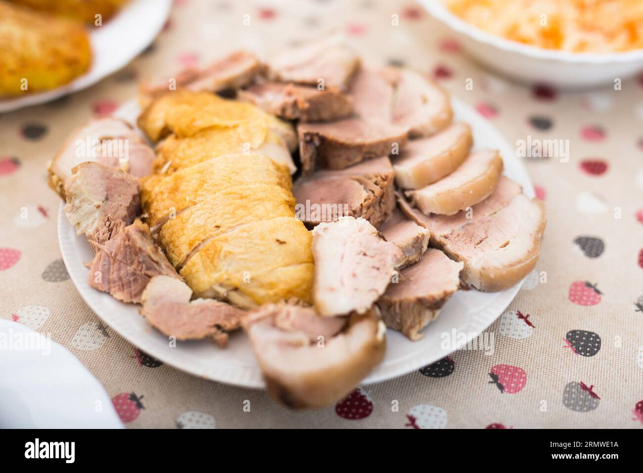 Cold cuts of different types of cooked meat on plate Stock Photo - Alamy